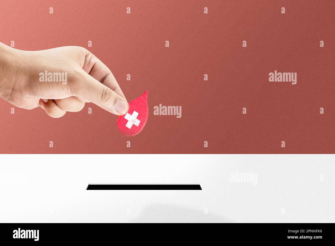 Human hand giving a donation. World blood donor day concept Stock Photo ...