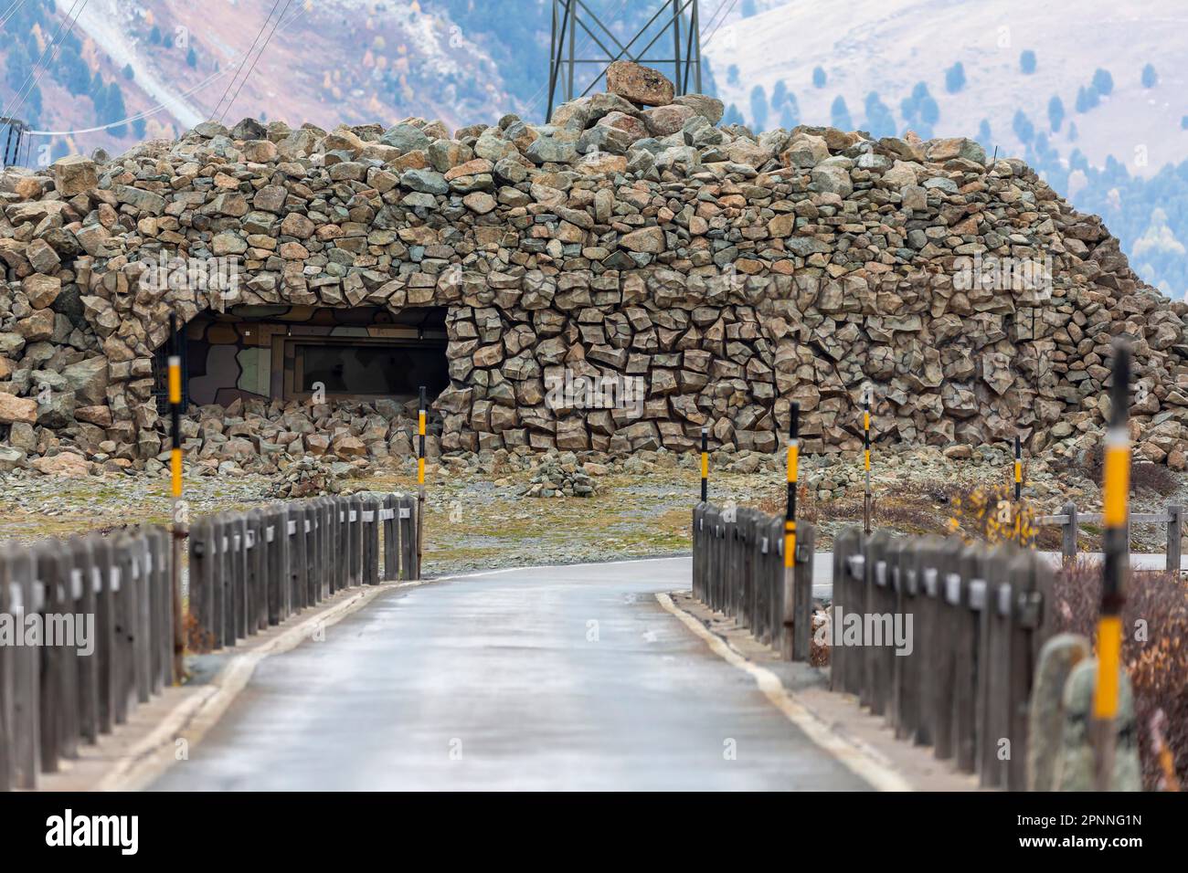 Swiss military bunker for national defence, camouflaged in a boulder ...