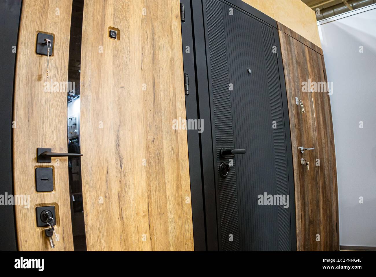 Modern iron front door with lock Stock Photo - Alamy