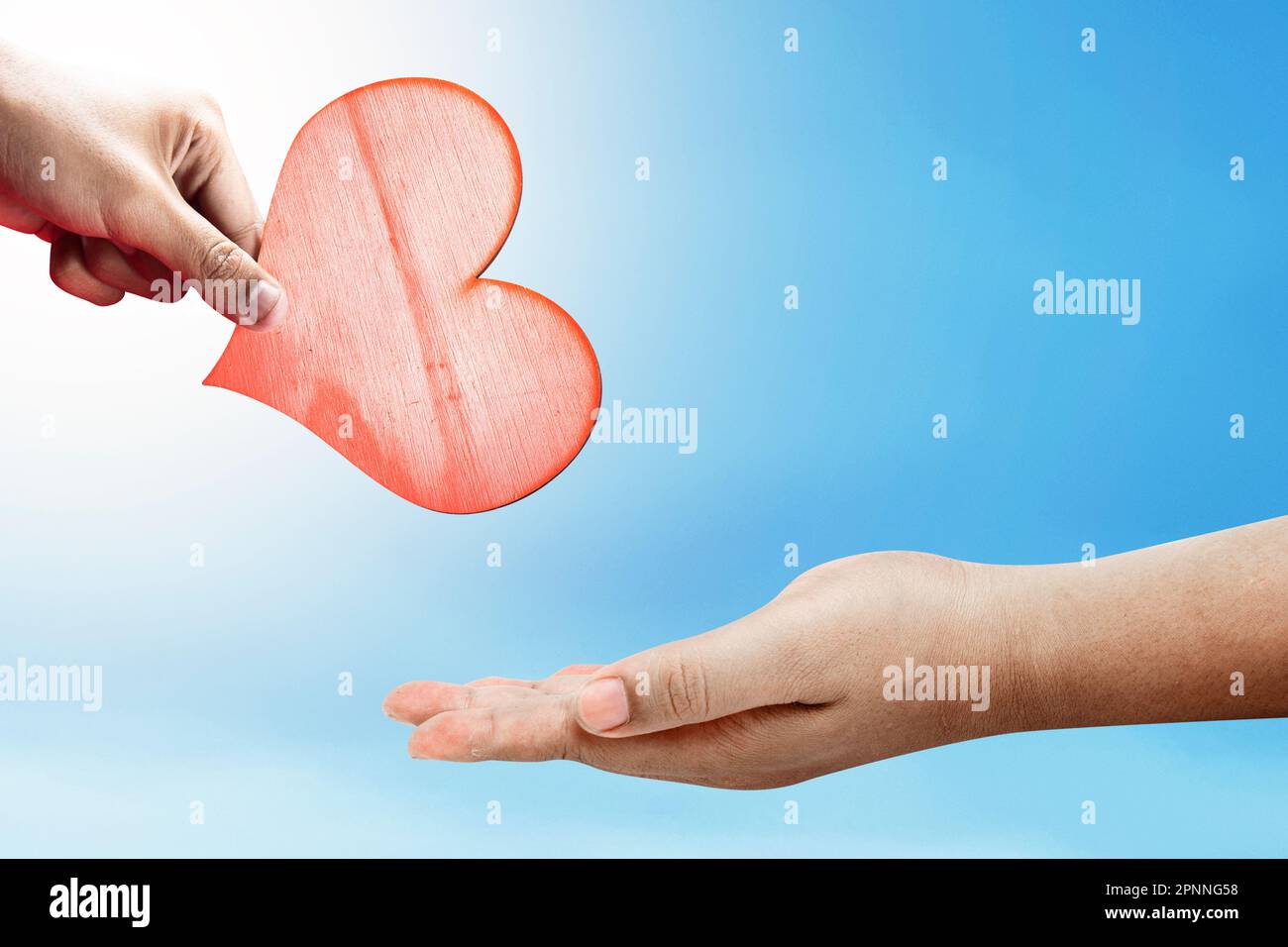 Human hand giving a donation. World blood donor day concept Stock Photo ...