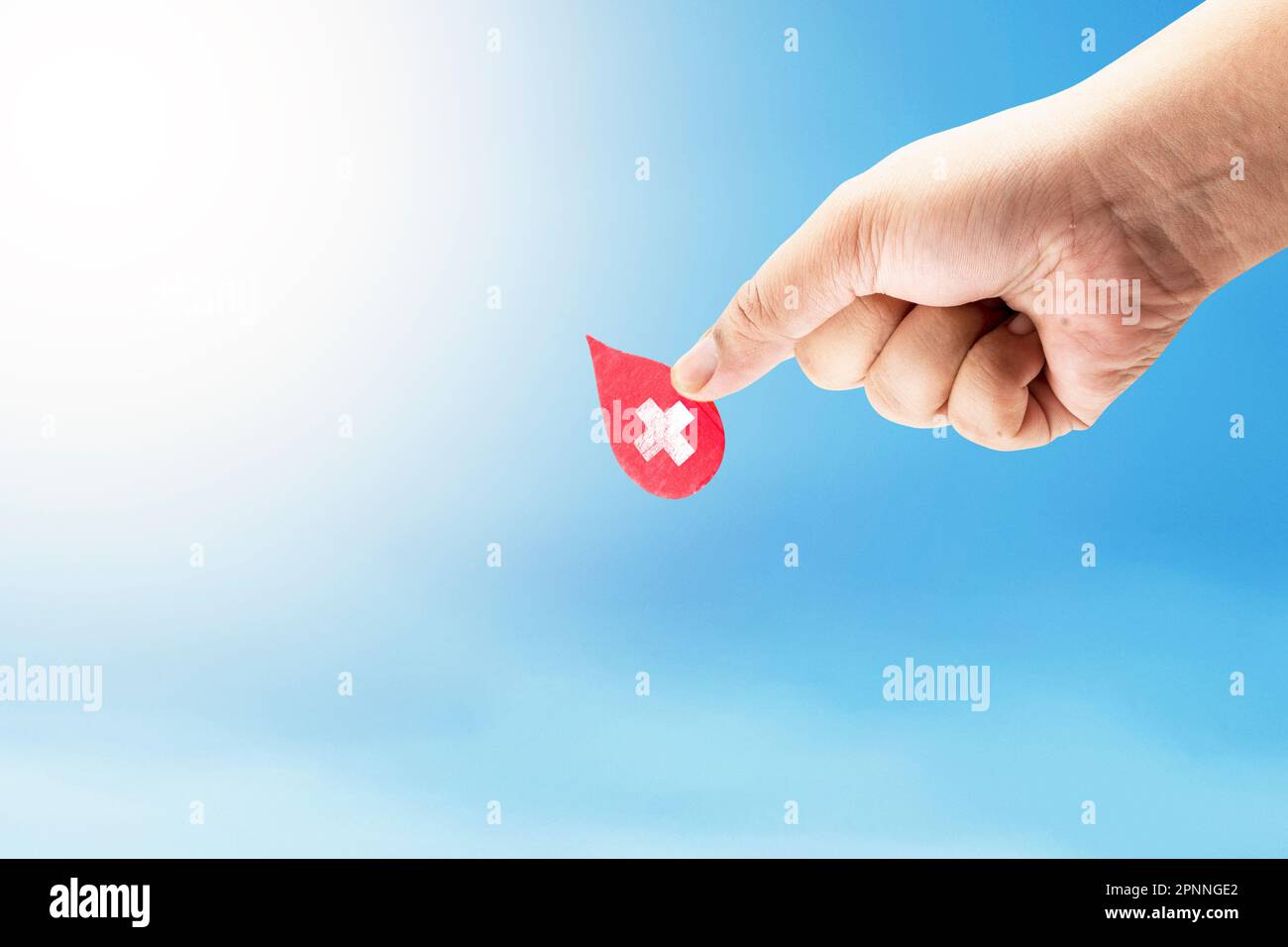 Human hand showing red blood drop. World blood donor day concept Stock ...