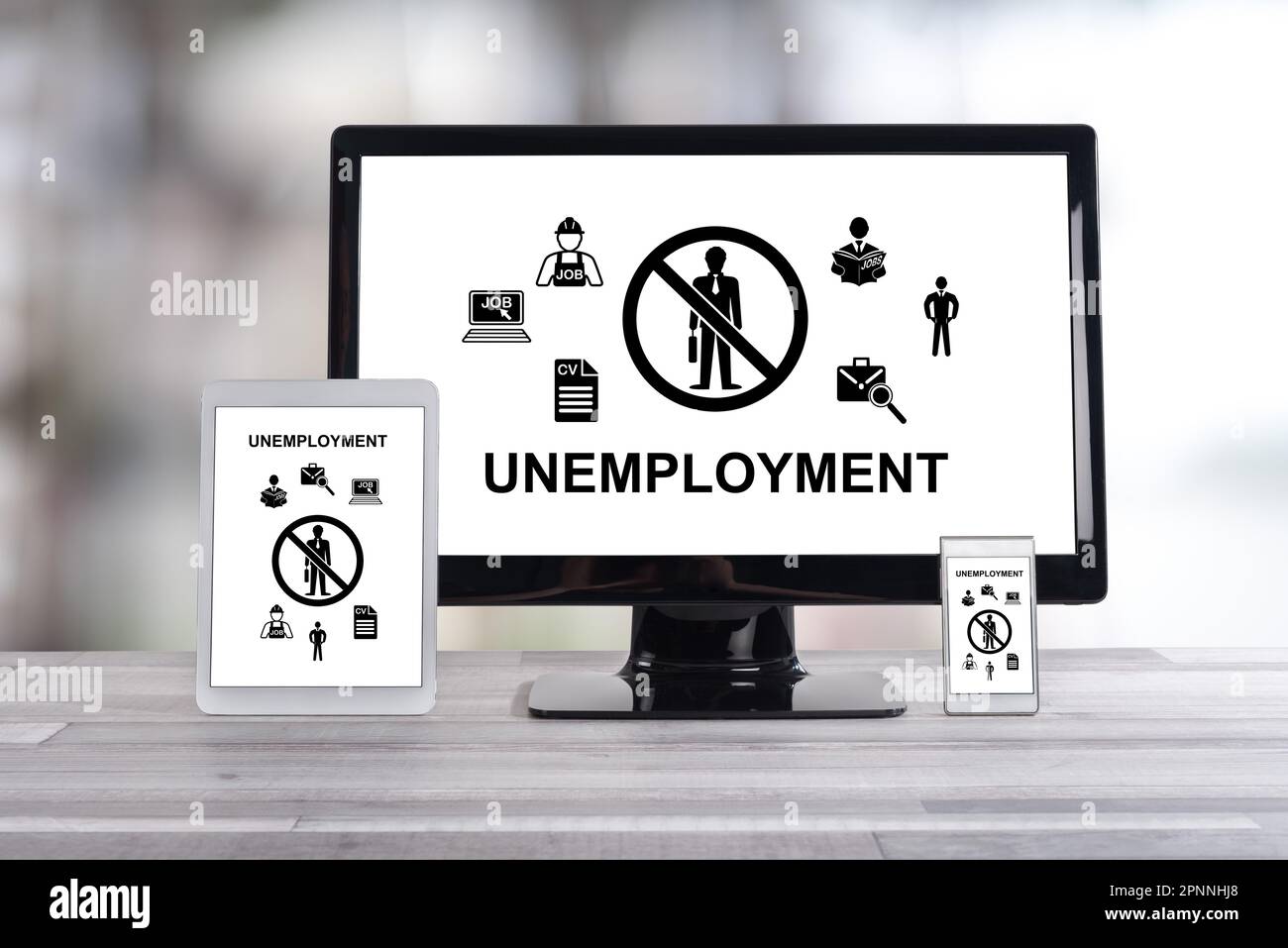 Unemployment concept shown on different information technology devices ...