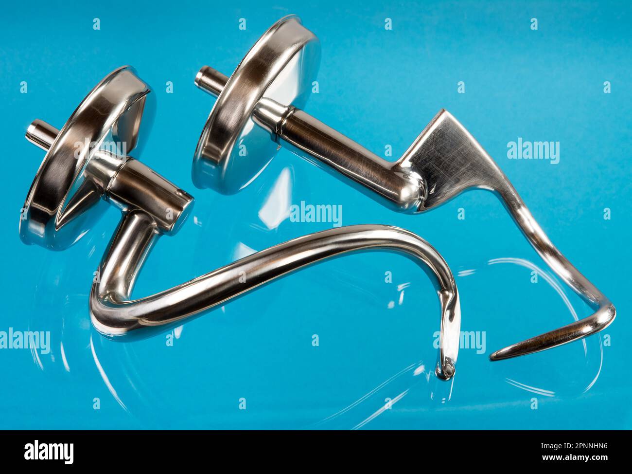Two different dough hooks for a kitchen machine Stock Photo - Alamy