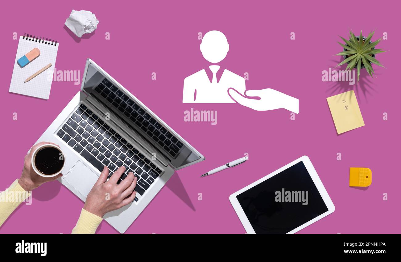 Top view of hands using laptop with symbol of introduction concept ...