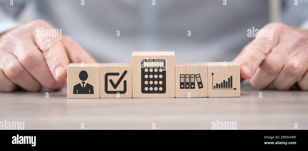 Wooden blocks with symbol of accounting concept Stock Photo - Alamy