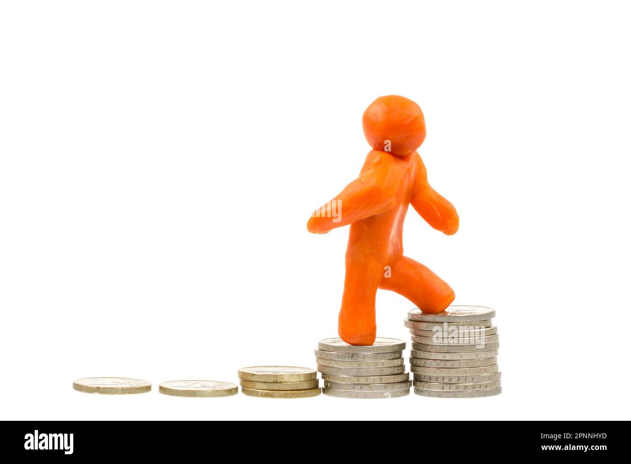 Climbing to the top - Self-made human plasticine figure climbing on a ...