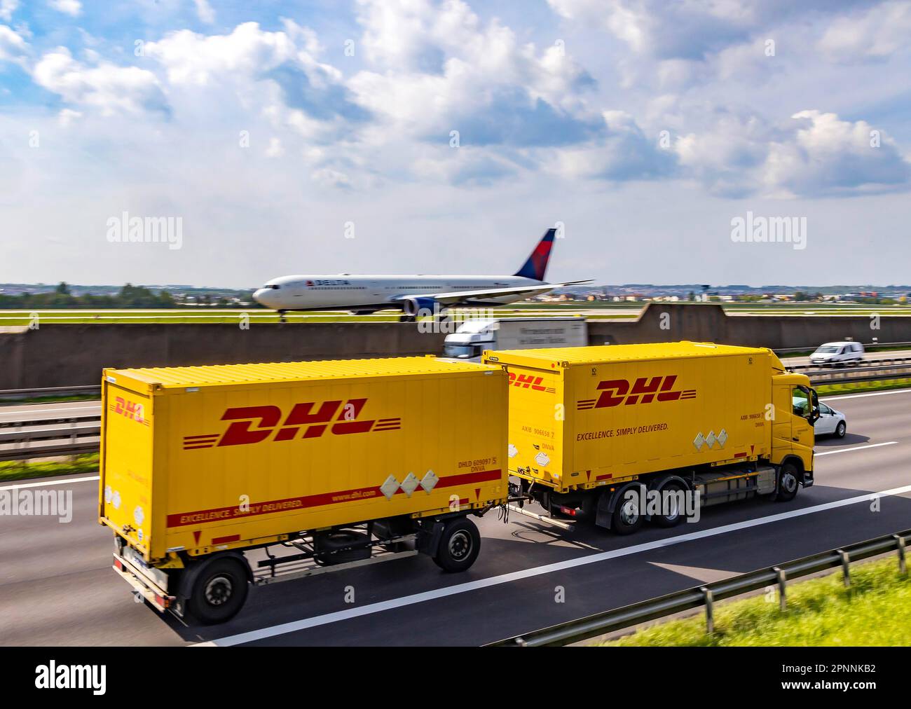 A8 motorway at the airport, Delta airline plane, DHL truck, Stuttgart ...