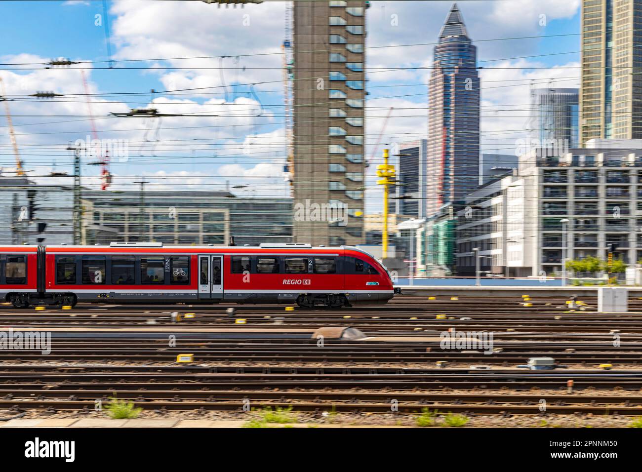 Regional train entering the main station, track apron, skyline ...