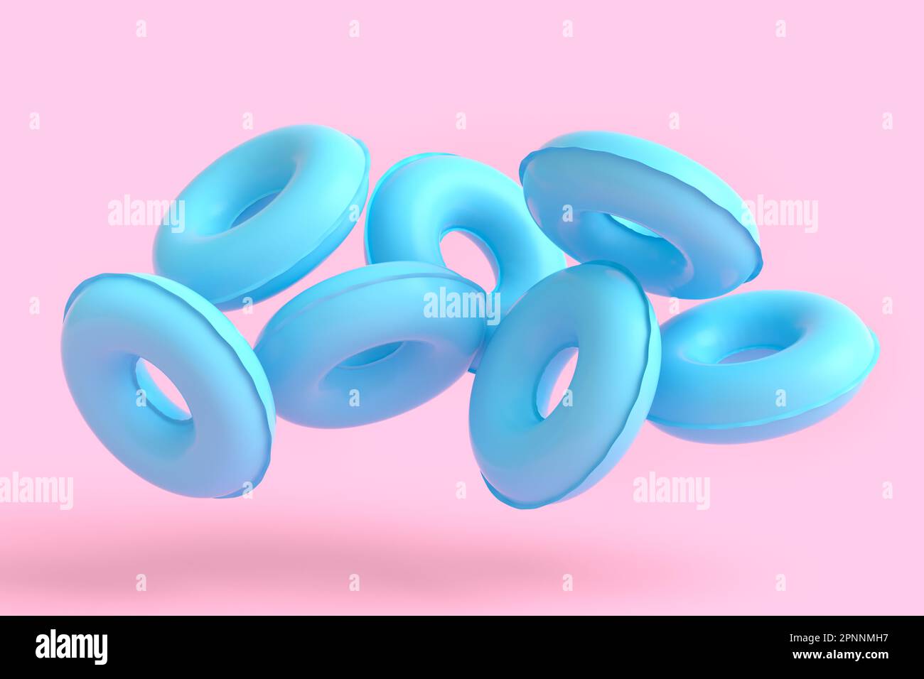 Colorful inflatable ring flying on monochrome background, summer ...