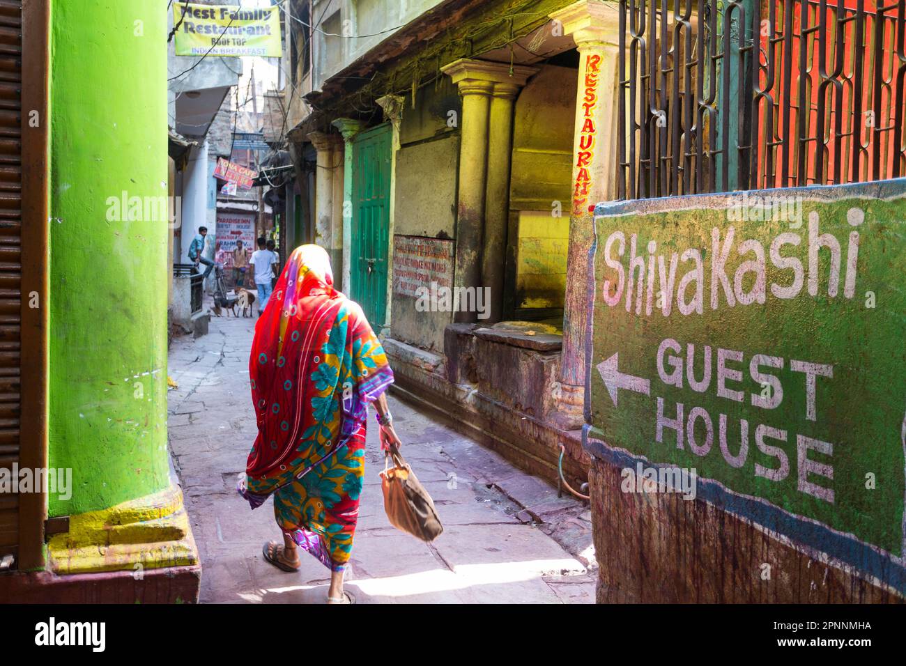 Woman in traditional dress in the city of Varanasi, Uttar Pradesh ...