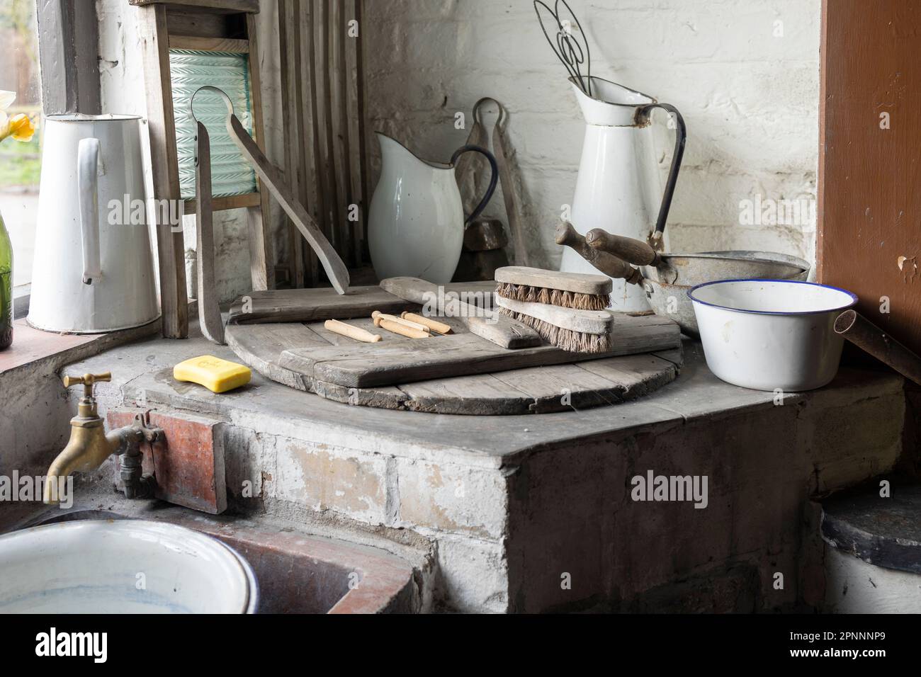 Corner of the yard with old washing facilities with washboard, washtub ...