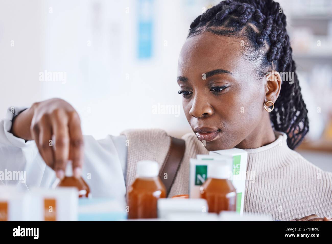 Serious black woman, patient and medication on shelf for cure, illness ...