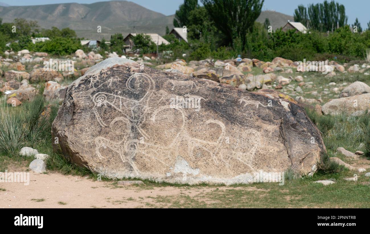Petroglyph in Kyrgyzstan. An ancient rock carving and engraving known ...