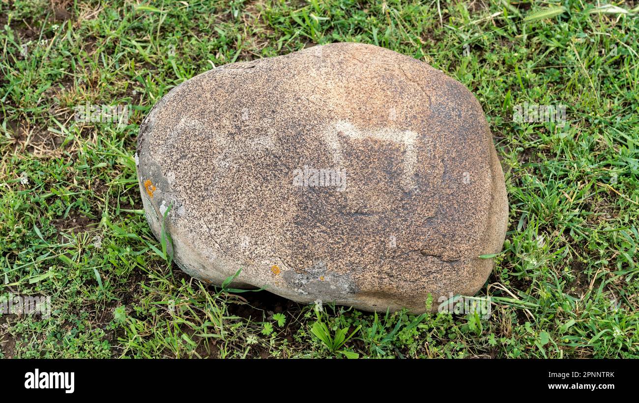 Petroglyph in Kyrgyzstan. An ancient rock carving and engraving known ...