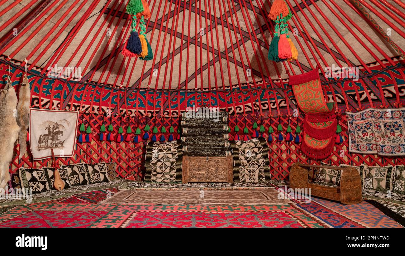 Inside view of a yurt, a circular tent in Kyrgyzstan that works as a ...