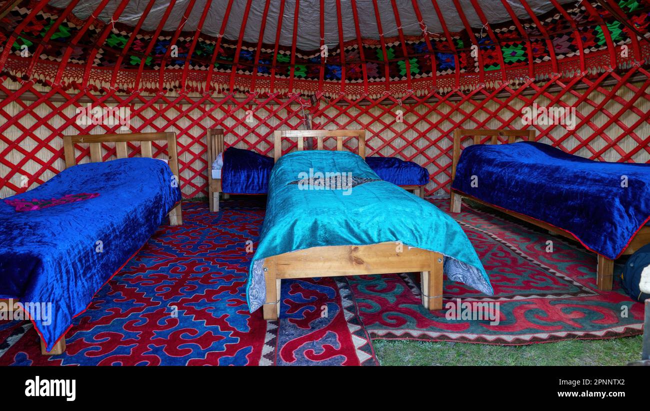 Inside view of a yurt, a circular tent in Kyrgyzstan that works as a ...