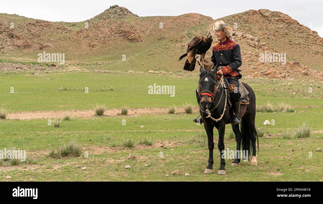 Issyk Kul, Kyrgyzstan - May 2022: Eagle trainer on a horse and his ...