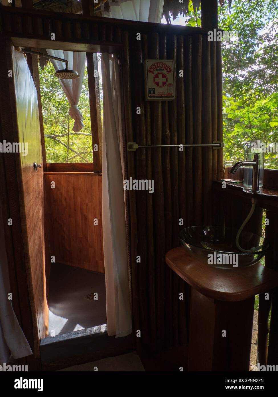 Glamping accommodation in the Amazon rainforest. Wooden treehouse ...