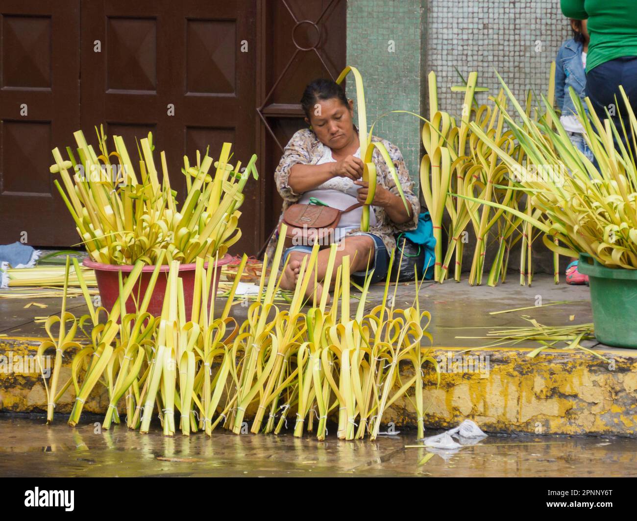 Iquitos, Peru- April, 2022: Peruvian woman is selling the palms made of ...