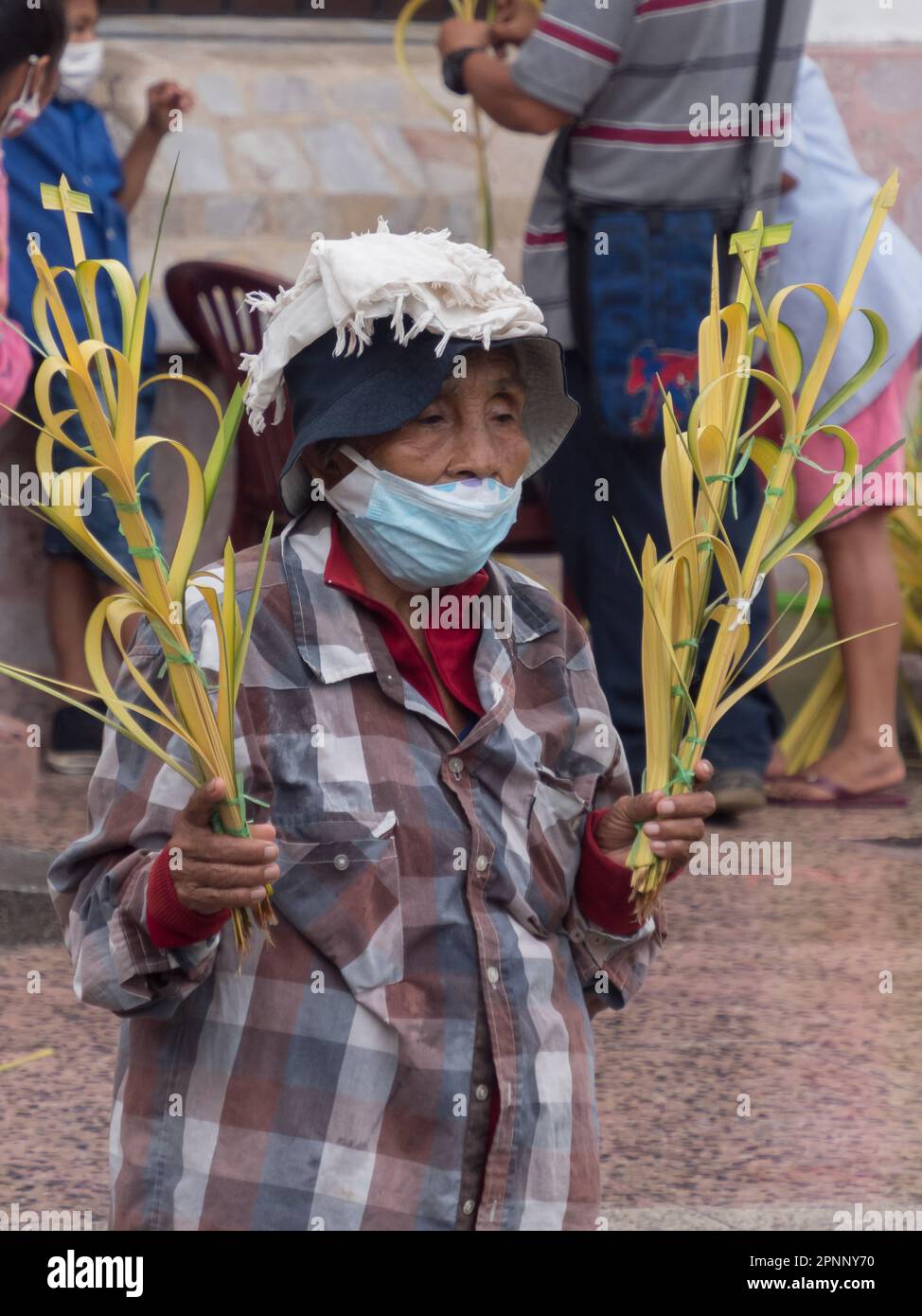 Iquitos, Peru- April, 2022: Peruvian woman is selling the palms made of ...