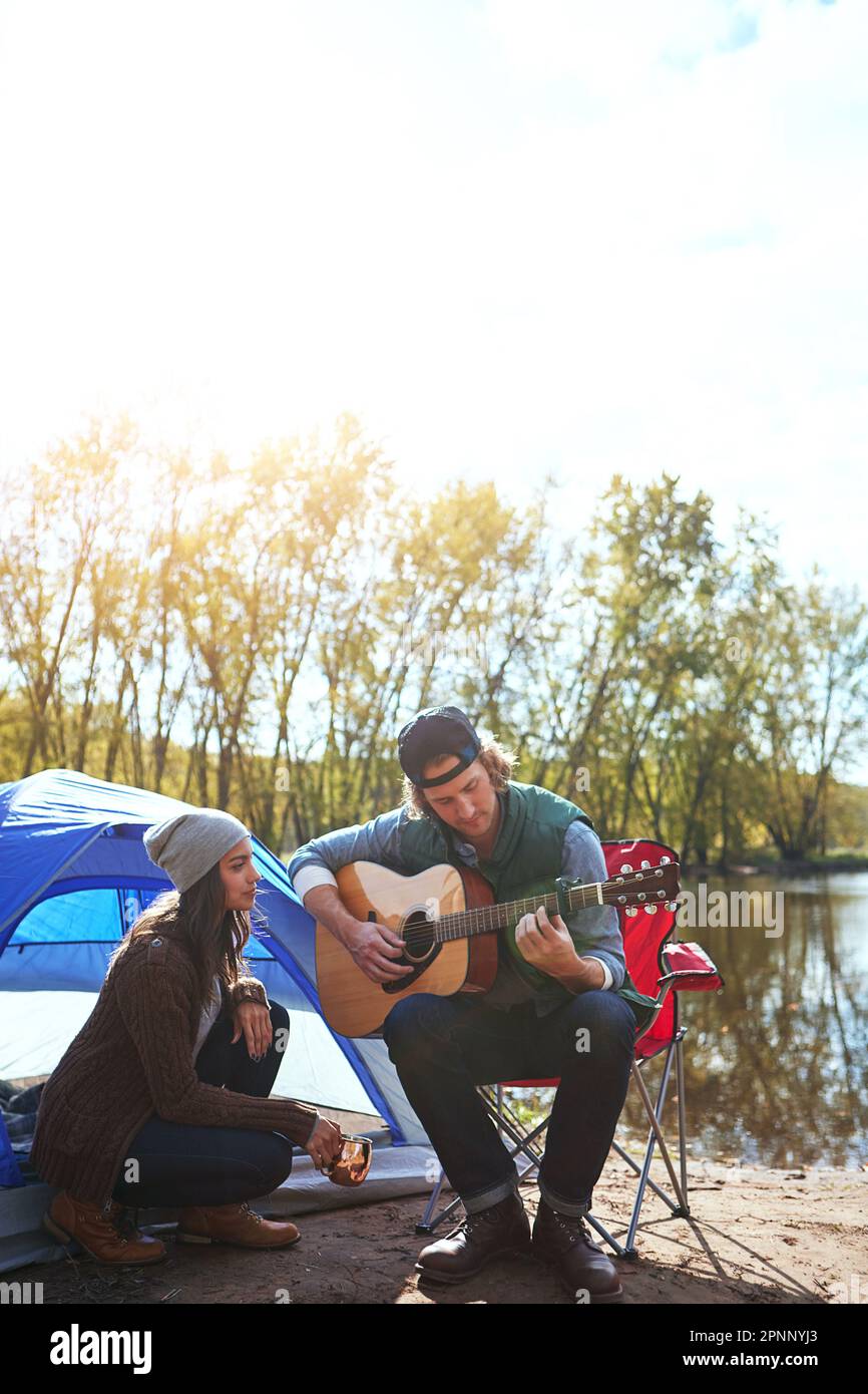 Lets make Smore memories. a young man playing his girlfriend a song on ...