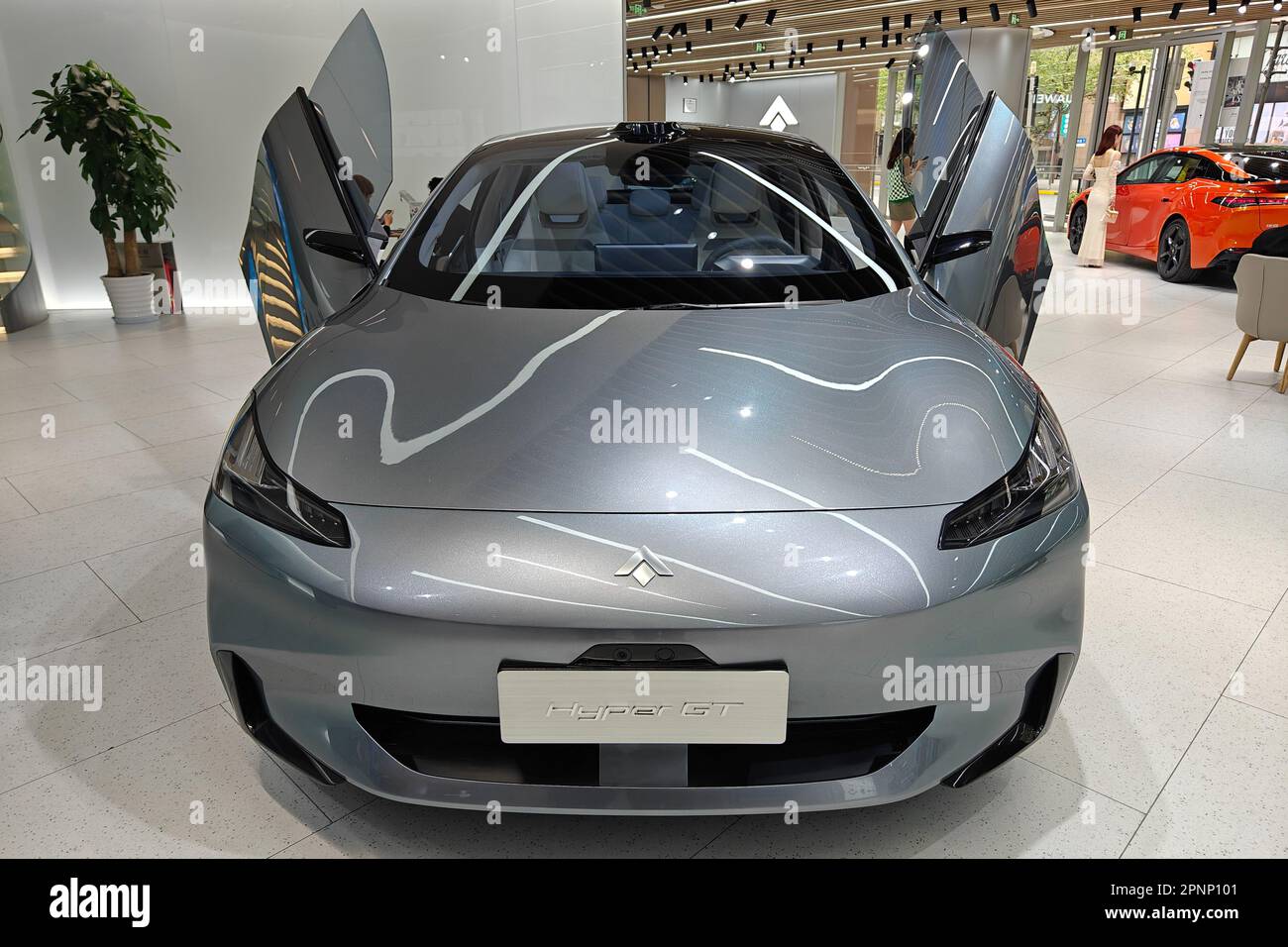 SHANGHAI, CHINA - APRIL 20, 2023 - Customers look at the Hyper GT model ...