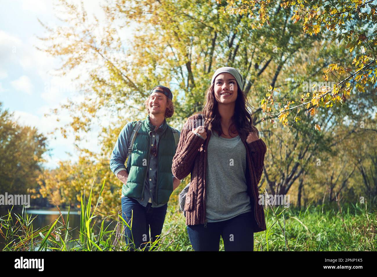 Hitting the trail. an affectionate young couple spending a day in ...