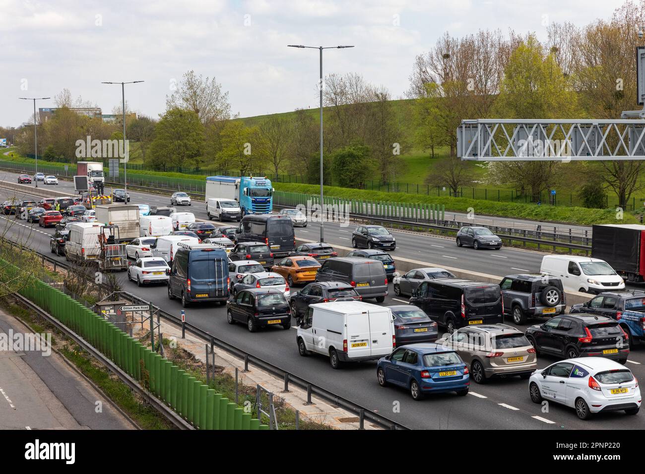 Slough, UK. 19th April, 2023. Vehicles pass along a recently completed ...