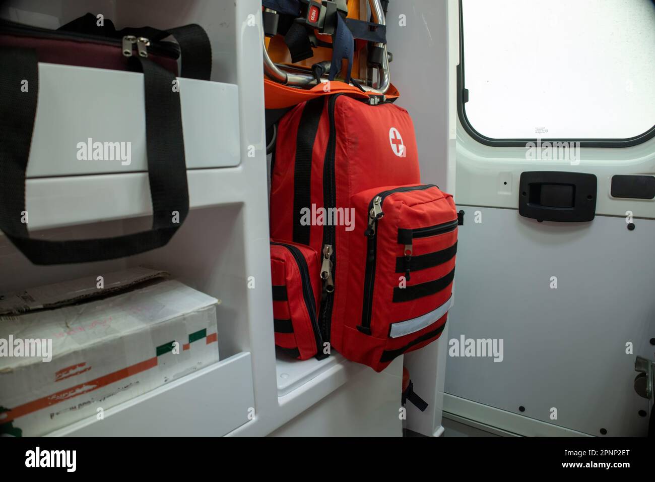 Medical red backpack in an ambulance Stock Photo - Alamy