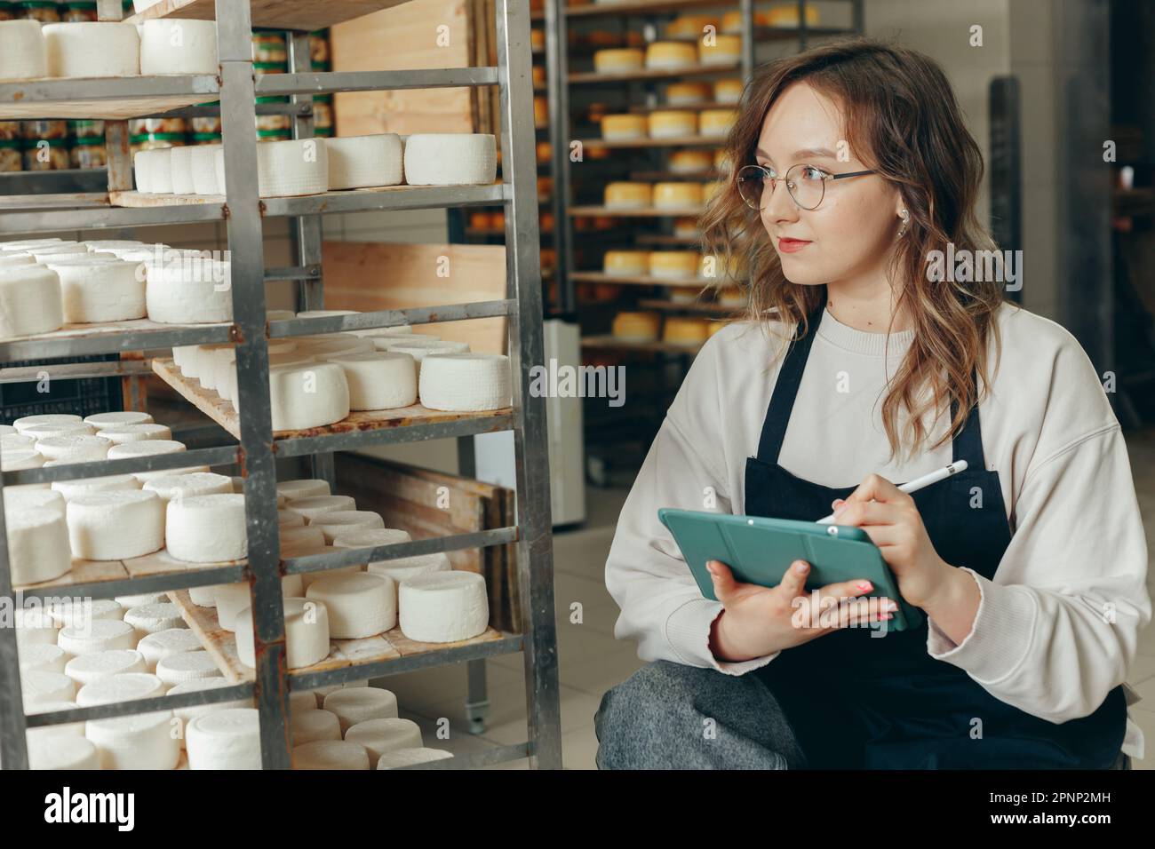 Young Farm Female Owner Controls Maturing Process of Goat Cheese Heads ...