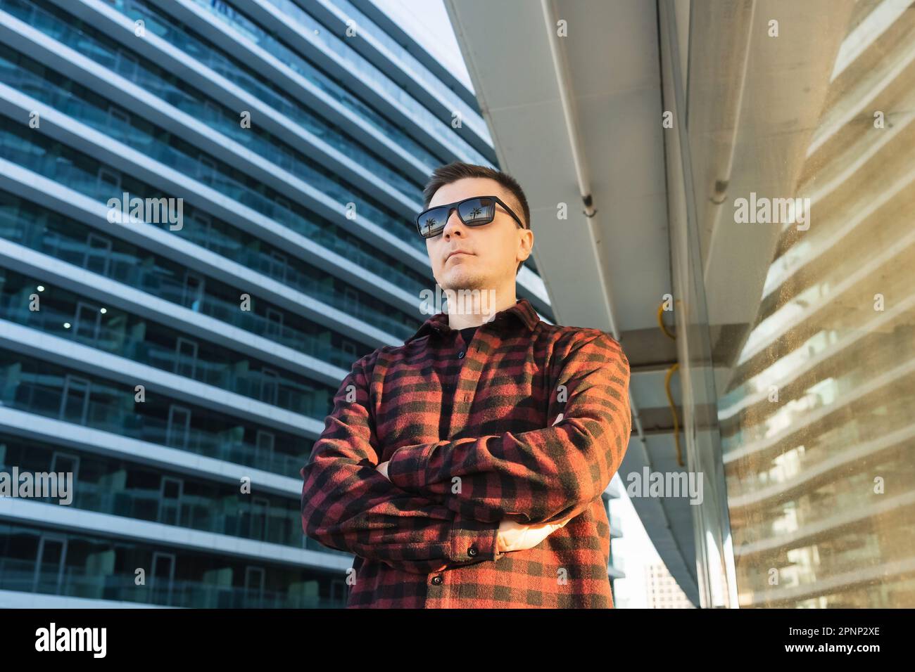 Portrait of positive cheerful reliable freelancer or IT specialist with ...