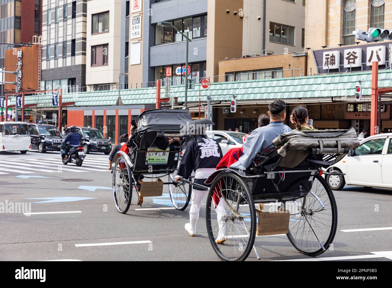Rickshaw, Tokyo April 2023 couple ride in a rickshaw on the streets of ...