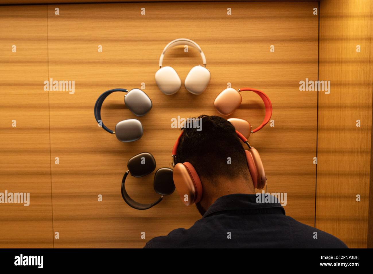 New Delhi, Delhi, India. 20th Apr, 2023. A man checks headphones at the ...