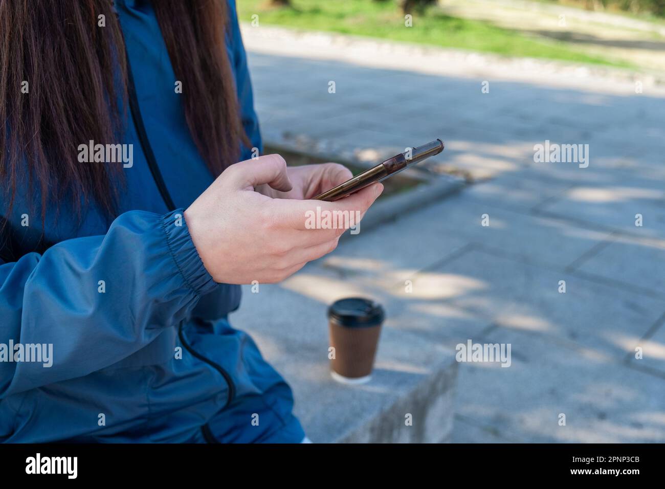 Mobile phone or smartphone in womans hand. Female using mobile phone ...