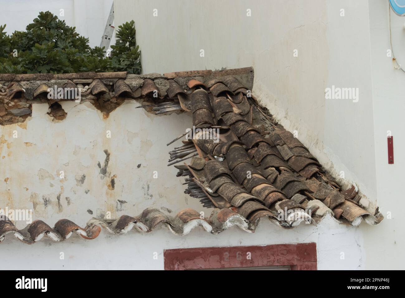 fallen roof with many fallen pan tiles in southern Portugal Stock Photo ...