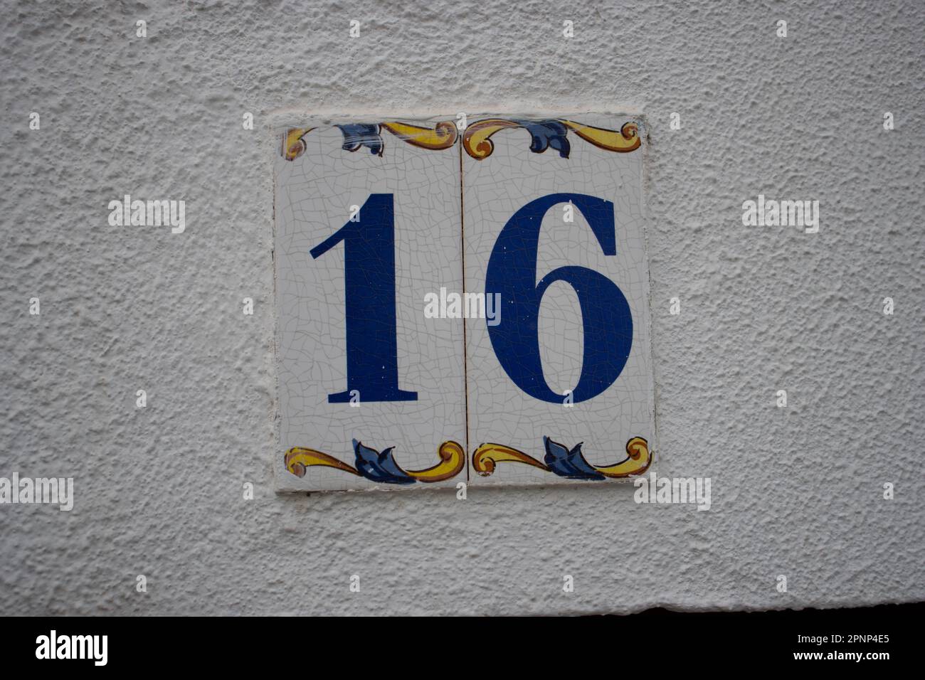 number 16 in traditional tiles in Portugal Stock Photo - Alamy