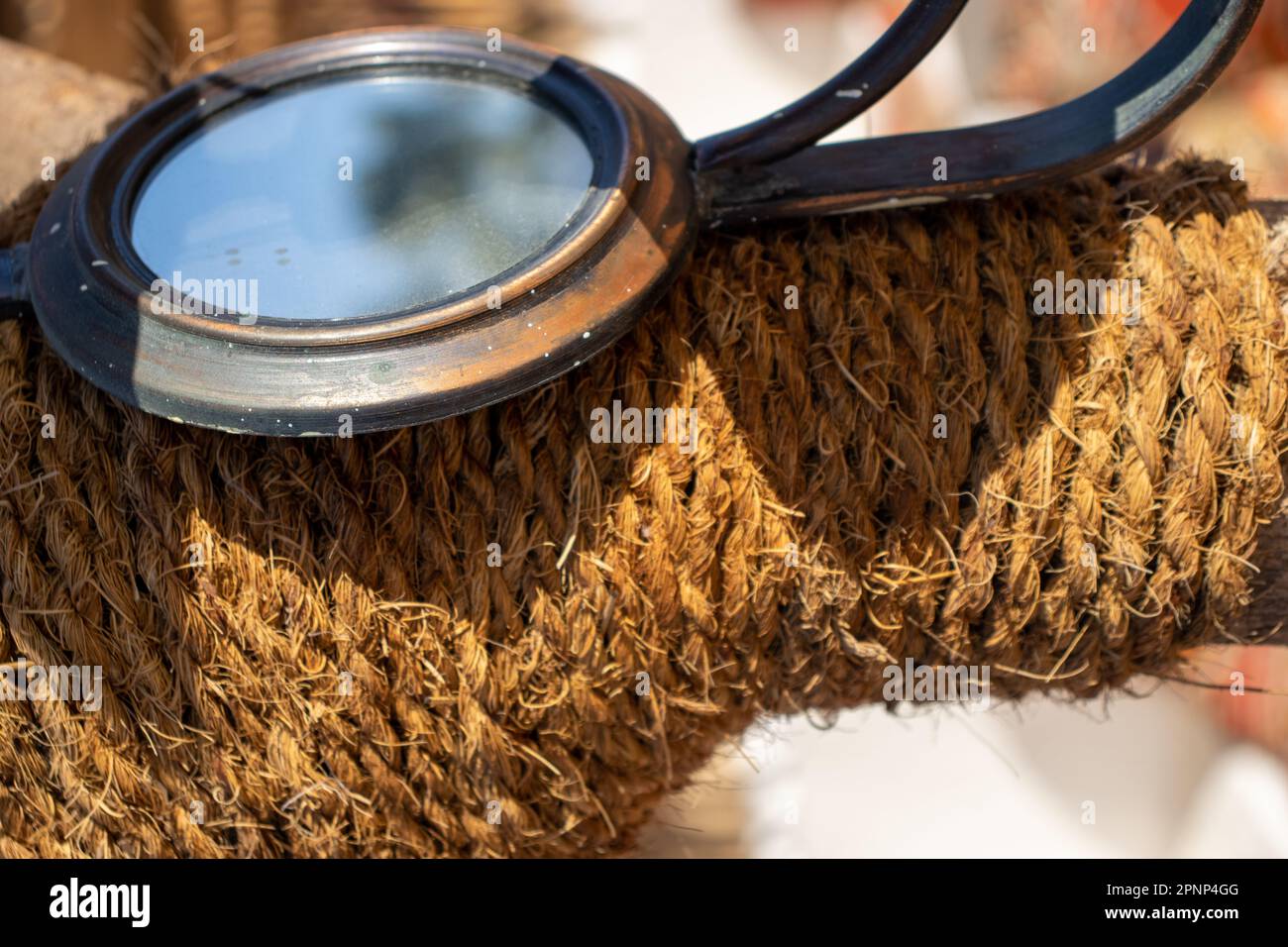 orange rope wound round wood texture Stock Photo - Alamy