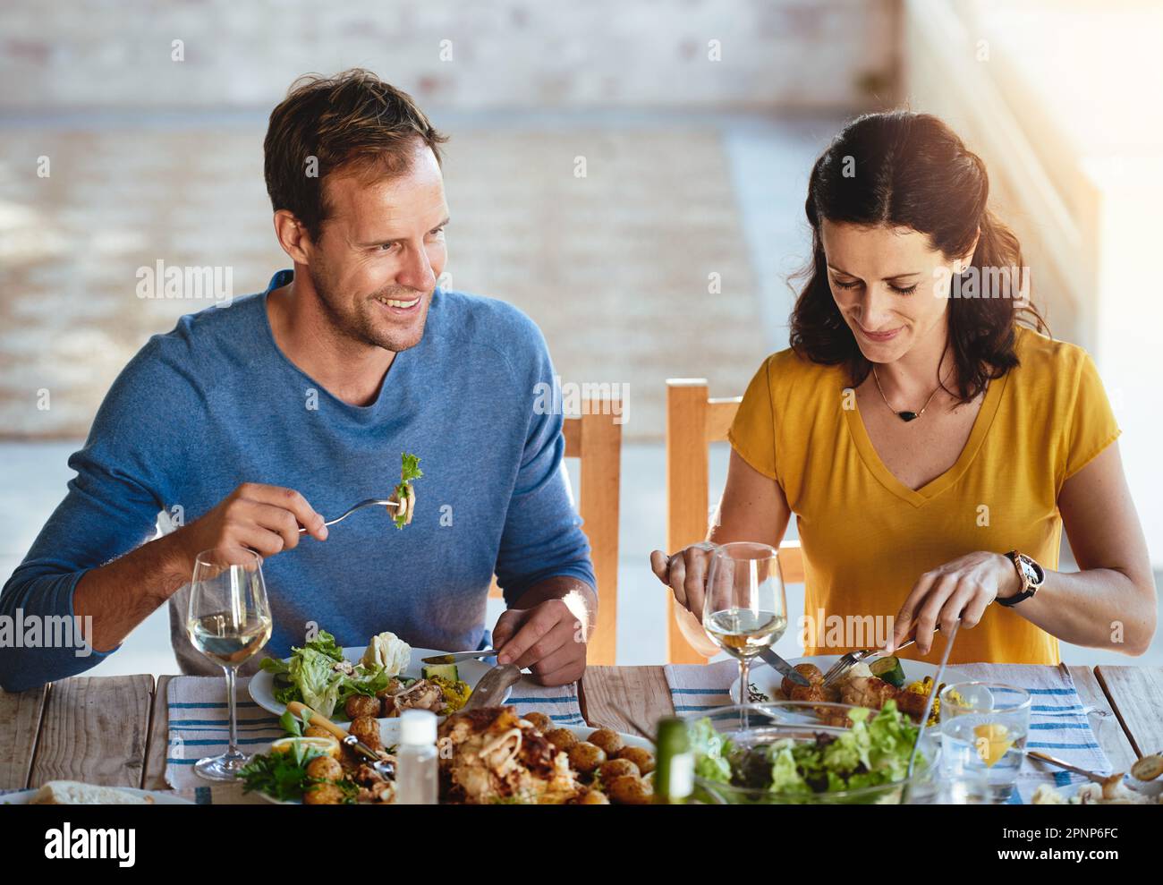 Great food, great company. a happy married couple enjoying lunch ...