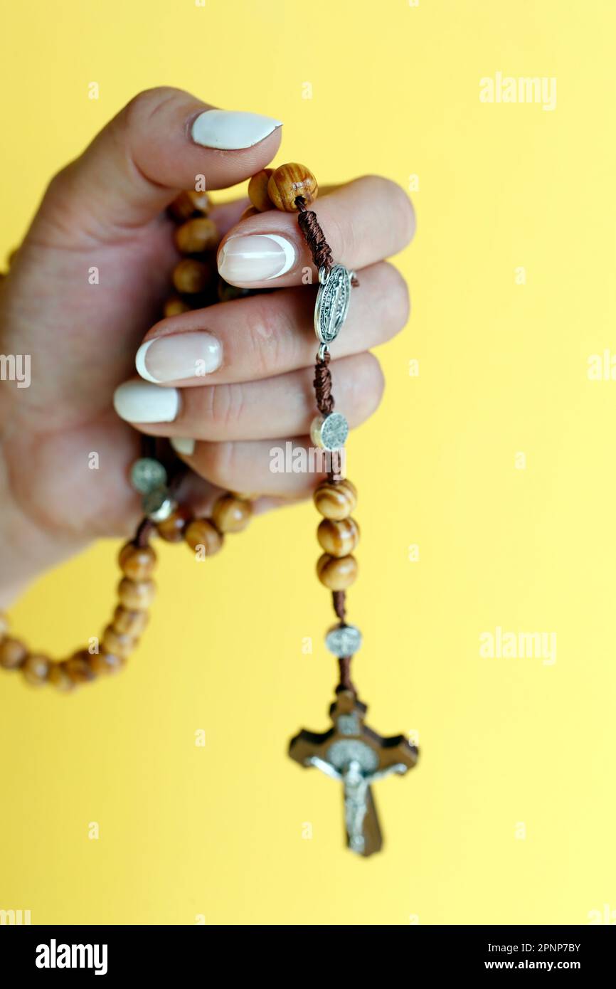 Praying hands rosary on hi-res stock photography and images - Alamy