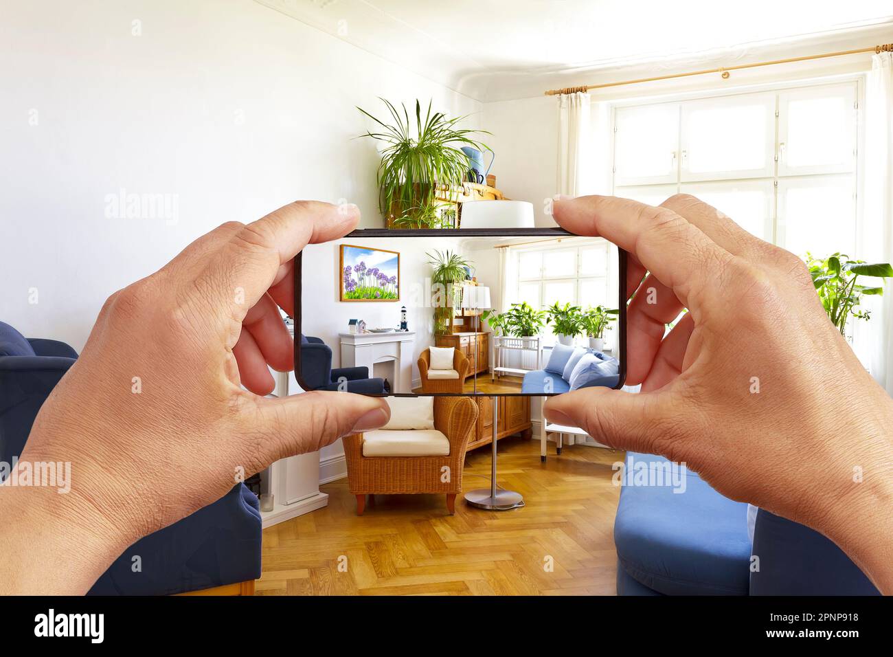 Augmented reality concept: hands holding smart phone with AR interior ...