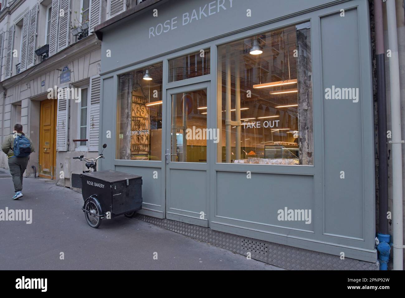 A load carrying cargo delivery bike outside a bakery in Paris, which ...