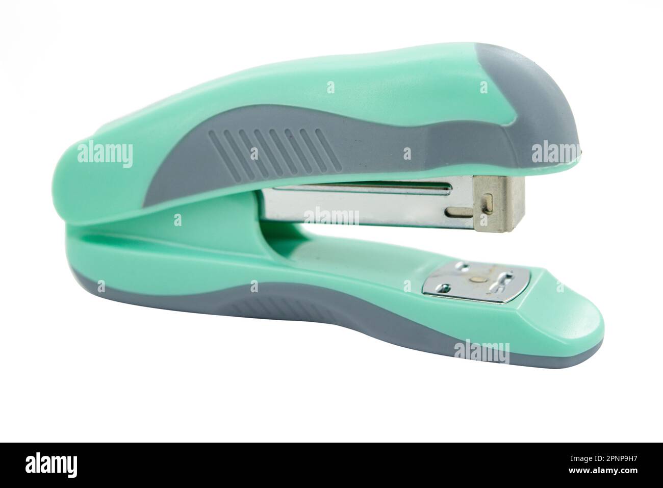Green professional stapler isolated on white background Stock Photo - Alamy