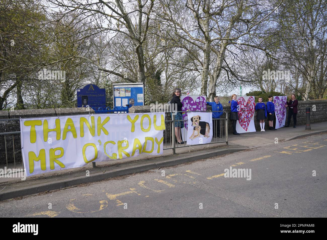 Pupils and teachers from Aldington Primary School pay their respects to ...
