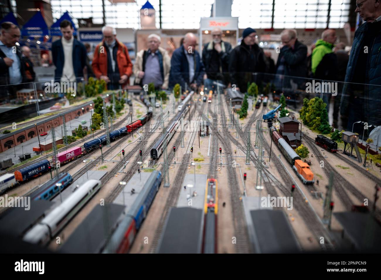 Dortmund, Germany. 20th Apr, 2023. Visitors stand around a miniature ...