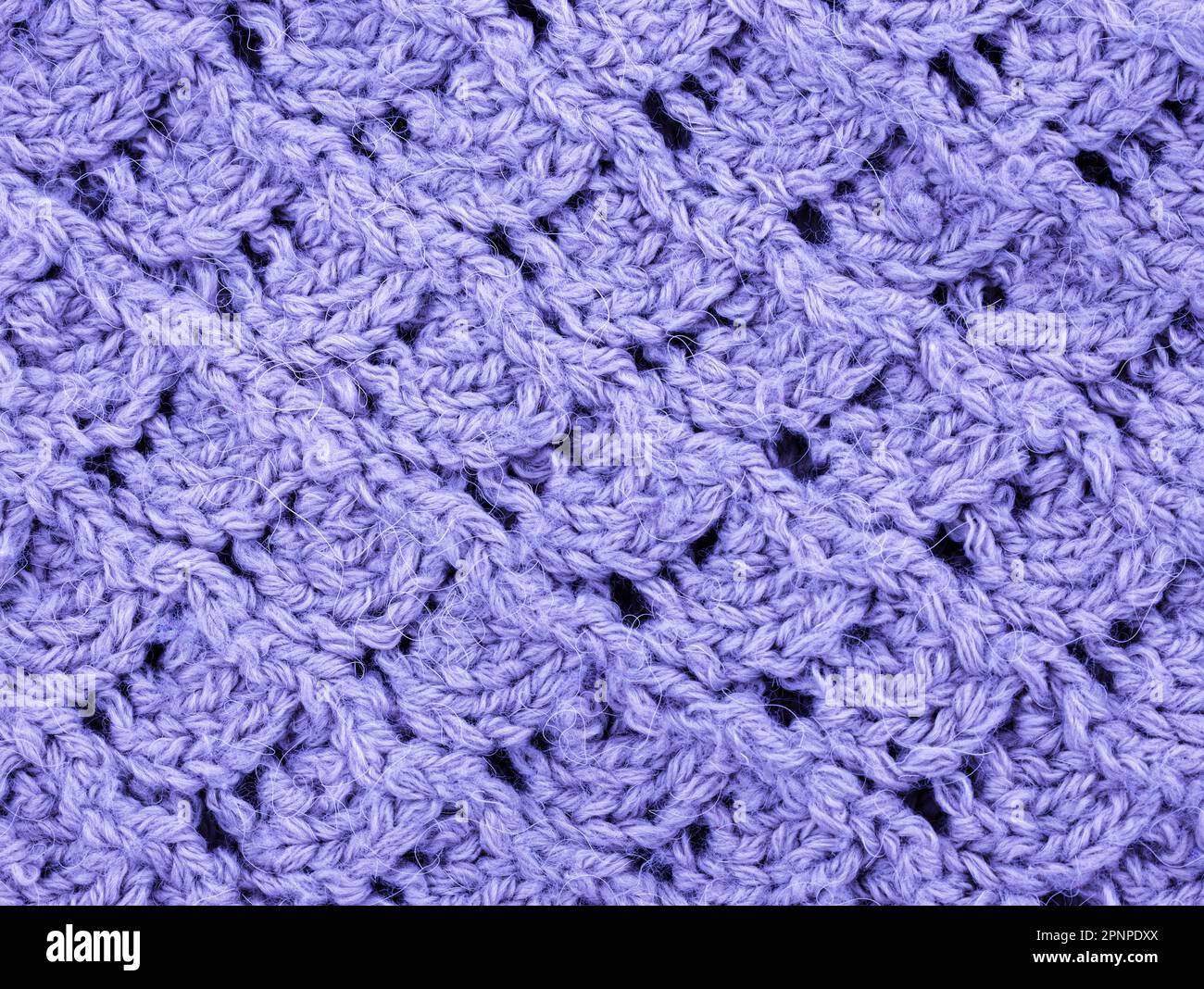 Purple Knitting pattern close-up. Knitting is an easy pattern for ...