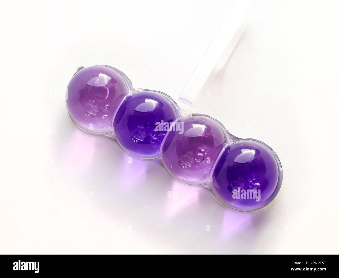 Colored balls for the toilet on a white background. Toilet block made ...