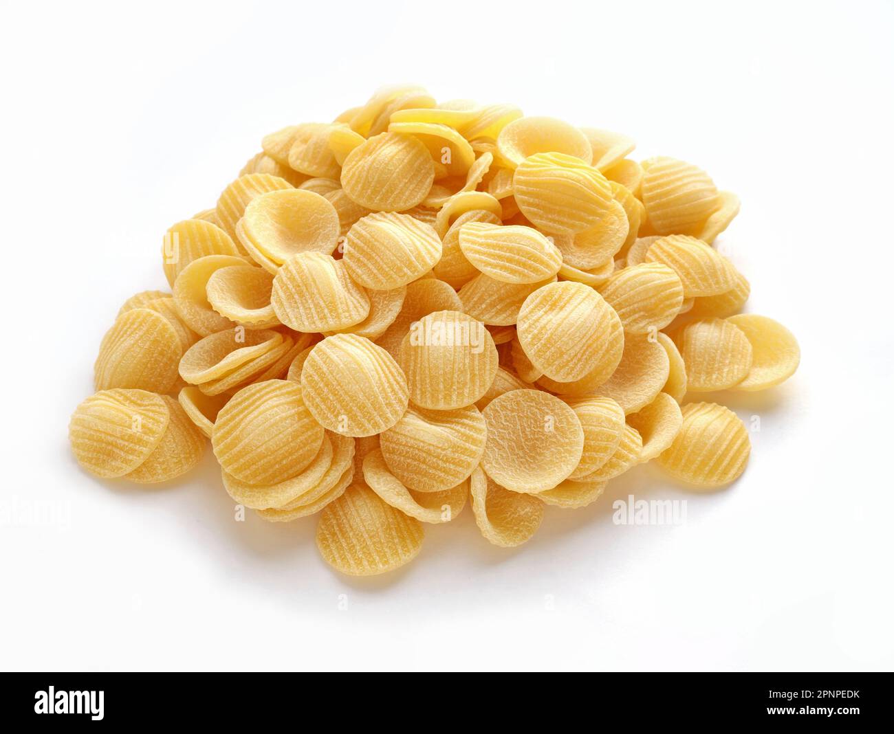 Raw striped shell pasta on white background with clipping path, italian ...