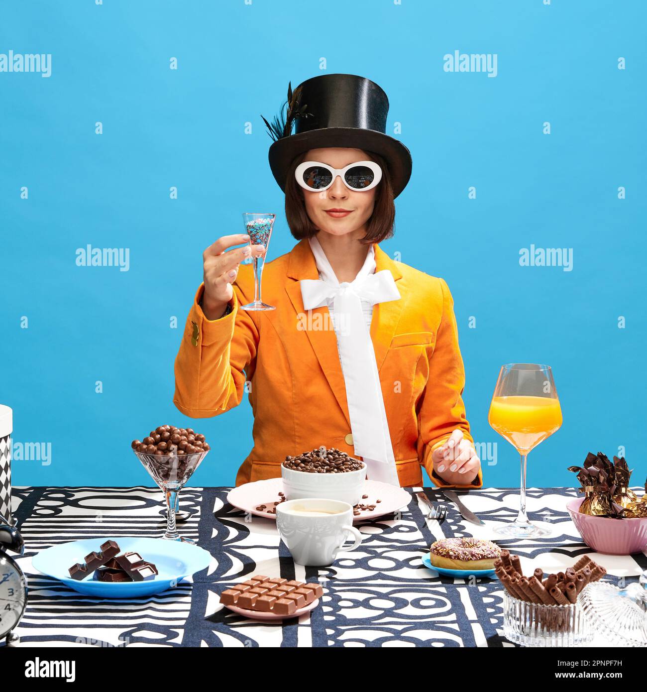 Vintage woman raising glass hi-res stock photography and images - Alamy