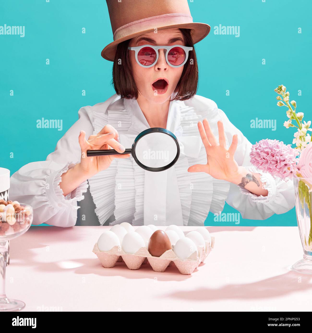 Shocked woman in sunglasses and cylinder hat emotionally looking in ...