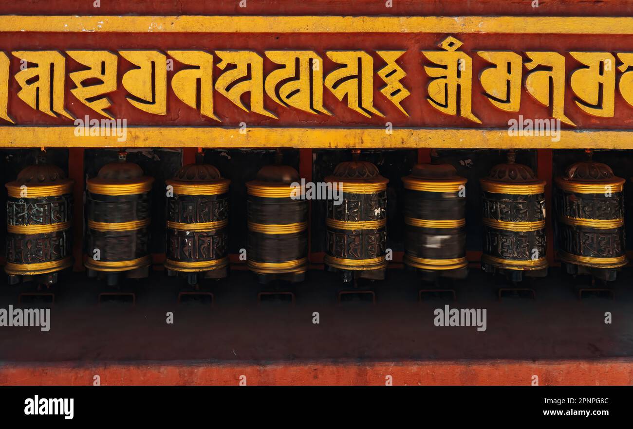 Turning prayer wheels mantra hi-res stock photography and images - Alamy